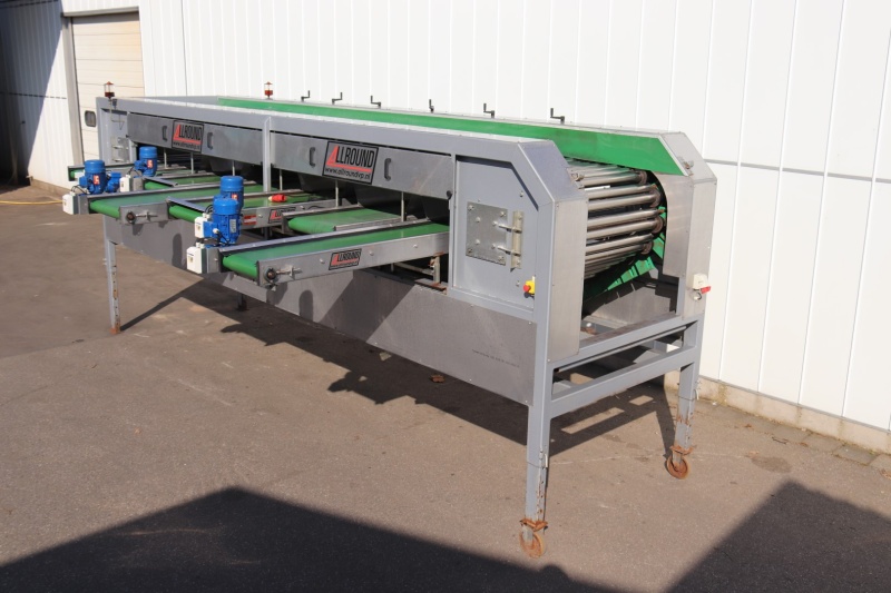 Allround radial rollergrader with 7 product conveyors • Duijndam Machines
