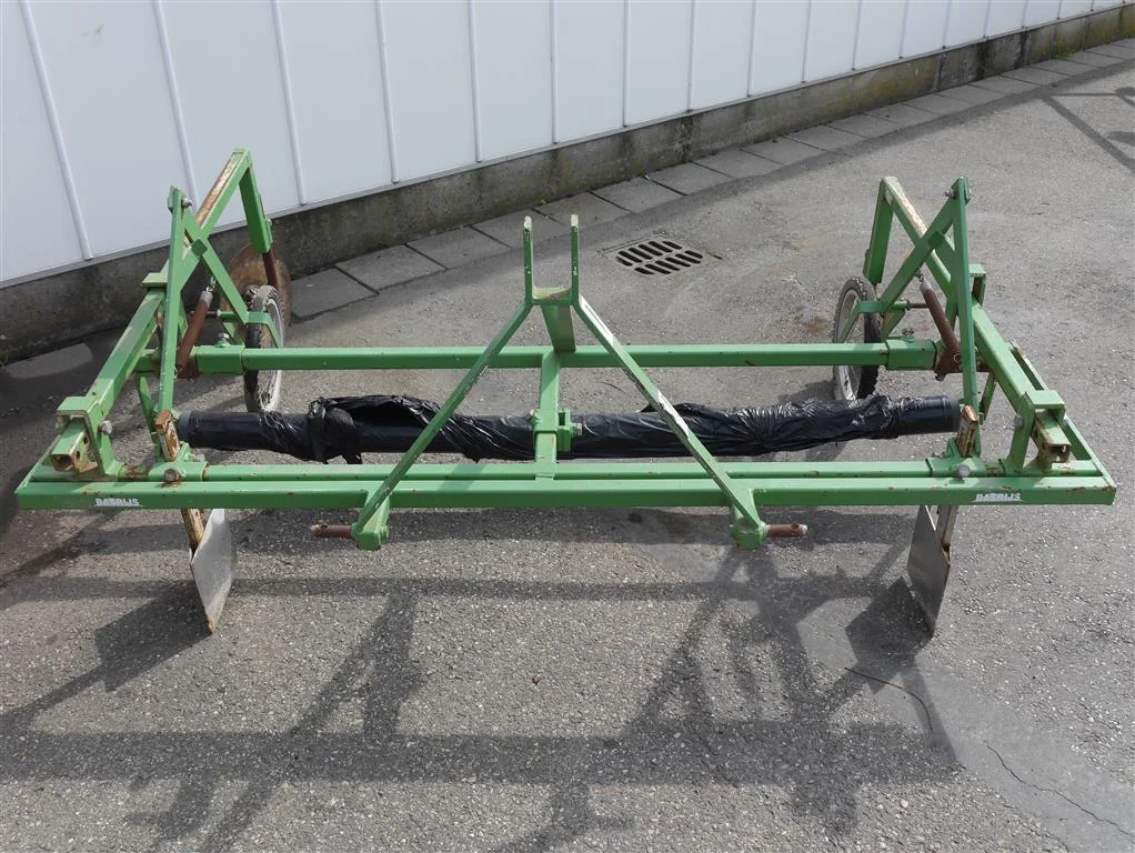 Basrijs plastic layer machine for depositing plastic over seed beds ...