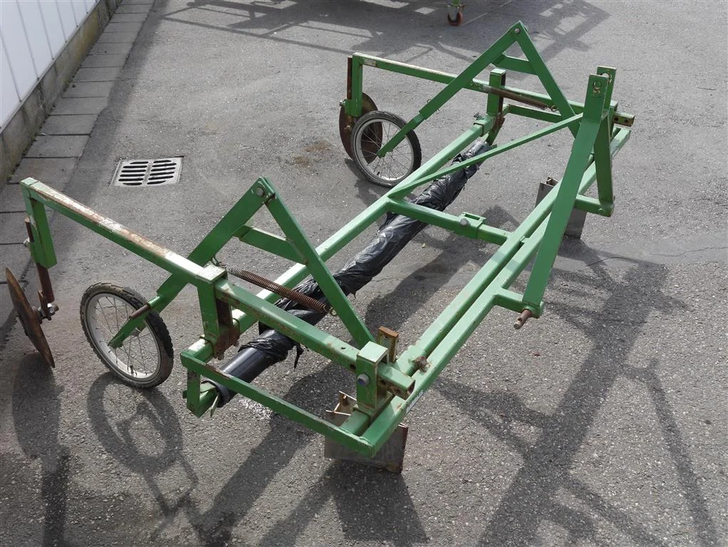 Basrijs plastic layer machine for depositing plastic over seed beds ...