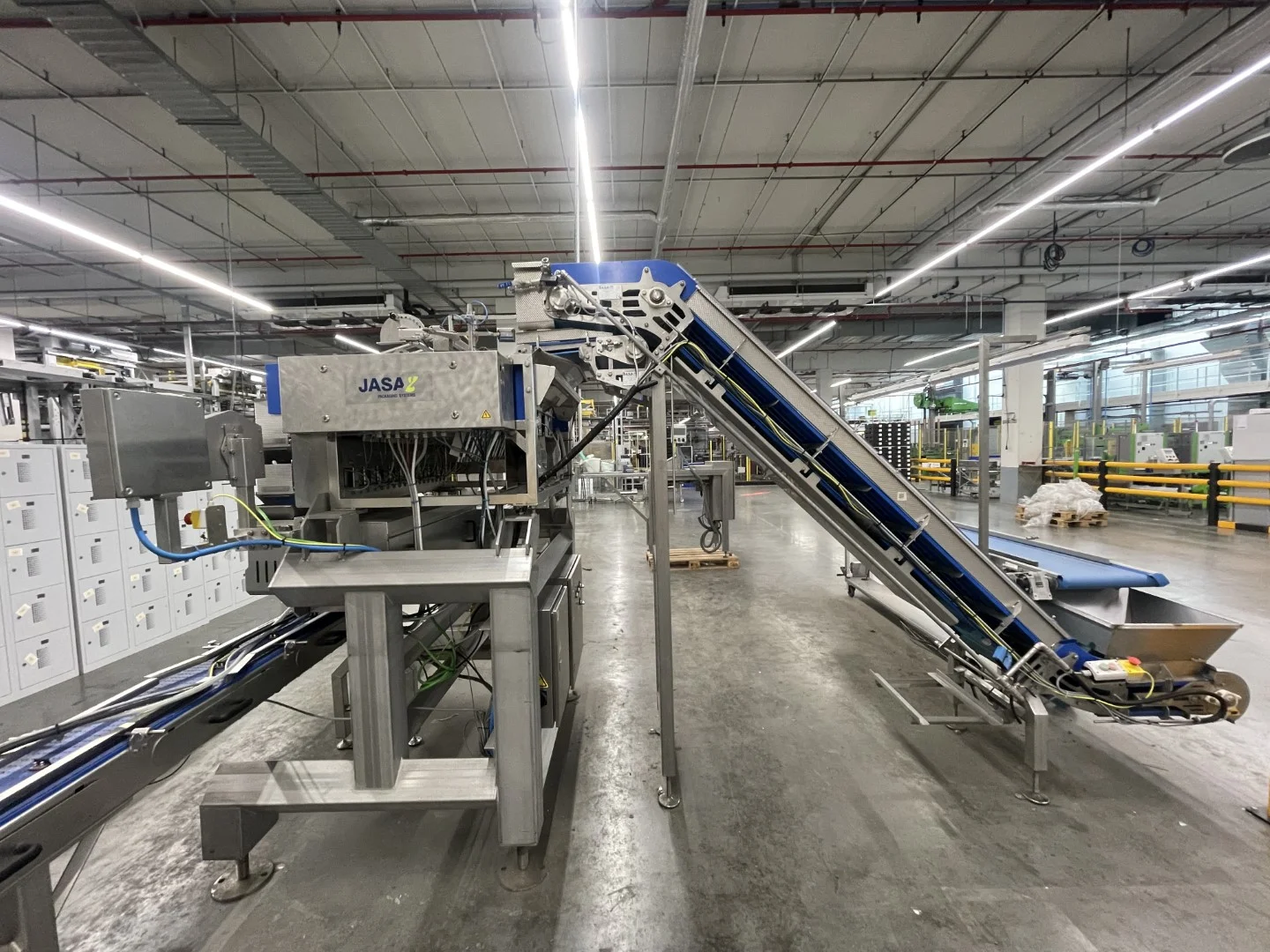 Newtec PCS2009 Weighing line for products in trays with flow pack ...