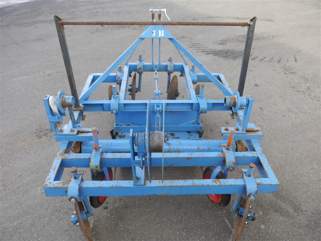 JB plastic layer machine for depositing plastic over seed beds ...