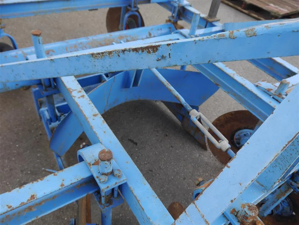 JB plastic layer machine for depositing plastic over seed beds ...
