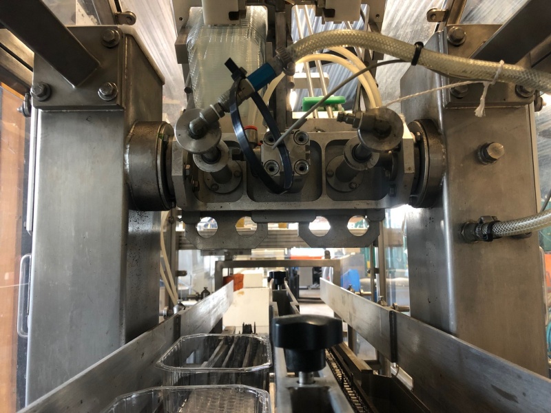 G.Mondini snap on lid machine • Duijndam Machines