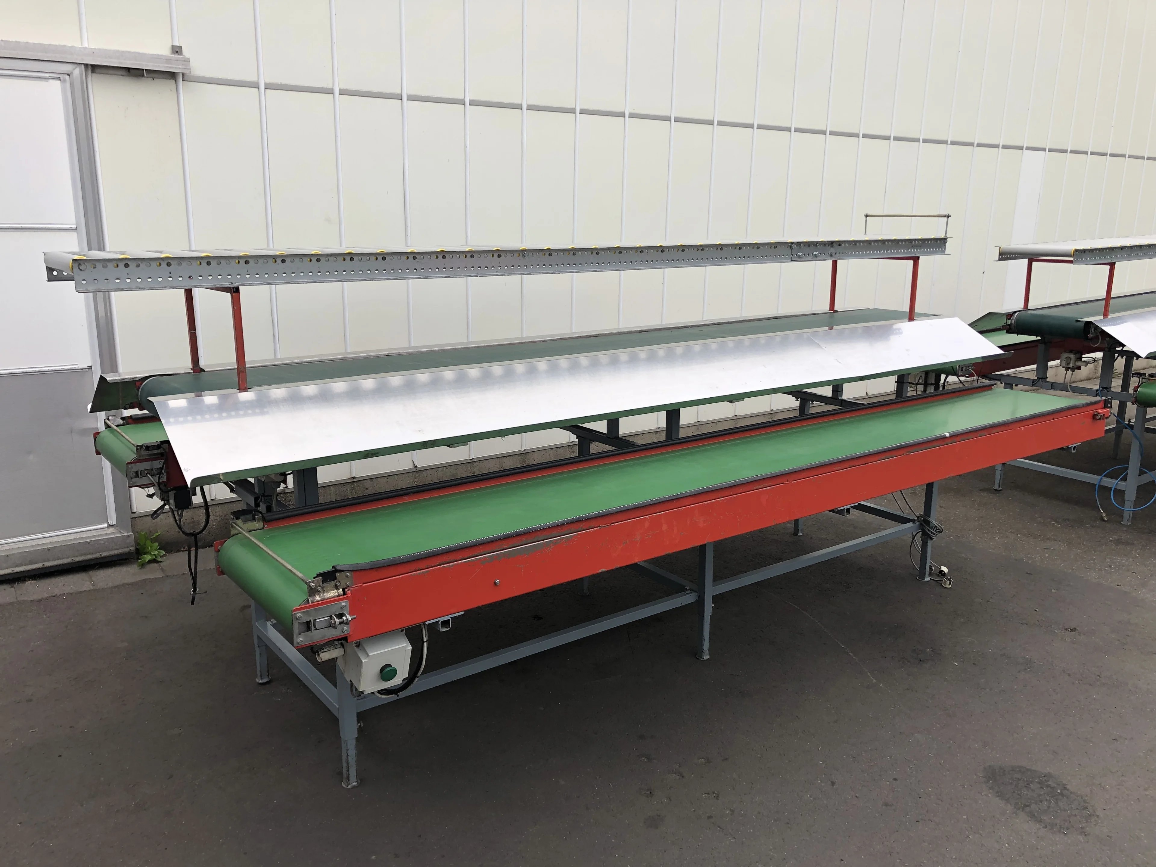 Stas combi packaging conveyors with roller conveyor • Duijndam Machines