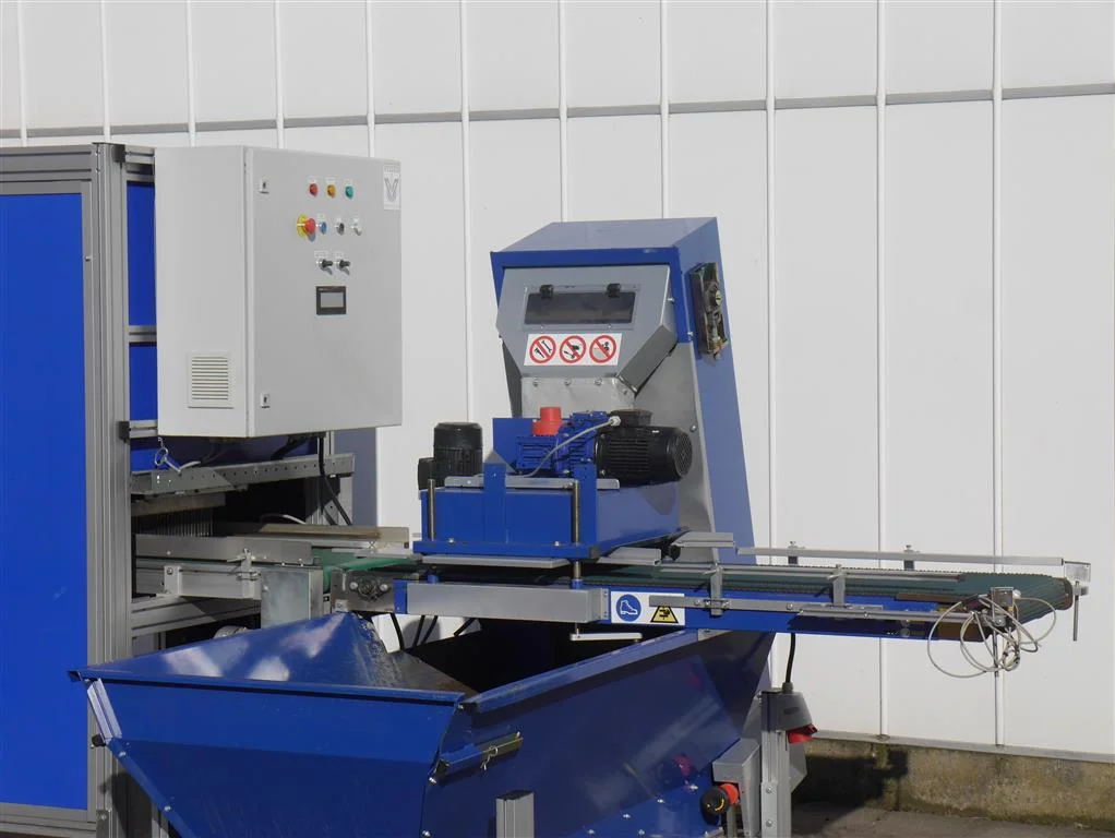 Visser EC-40 tray filling machine • Duijndam Machines